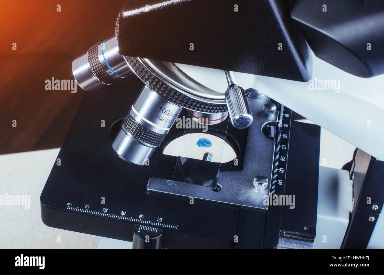Close up of microscope at the laboratory Stock Photo - Alamy