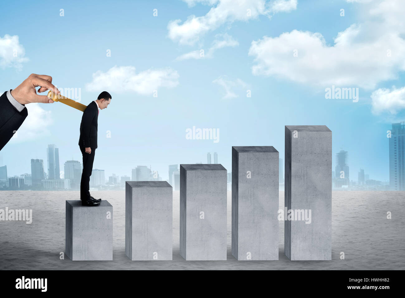 Hand turns clockwork on the back of business person, concept to control ...