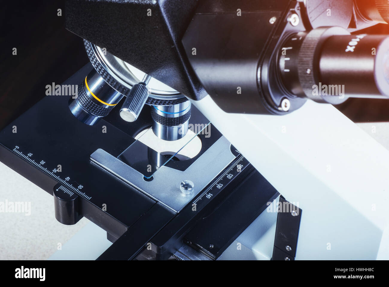 Close up of microscope at the laboratory Stock Photo - Alamy