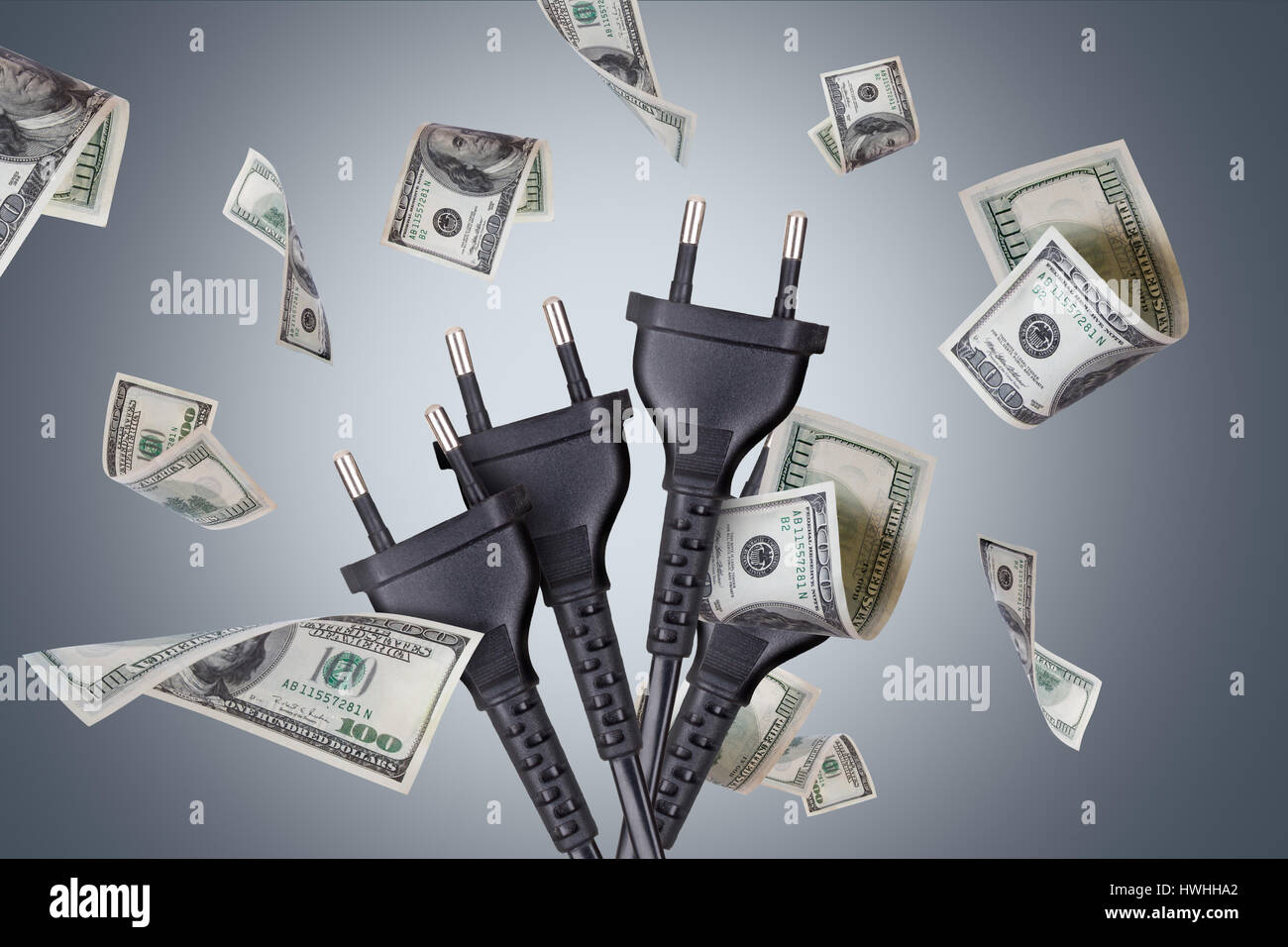 Close up detailed view of black plugs with dollar banknotes around, on ...