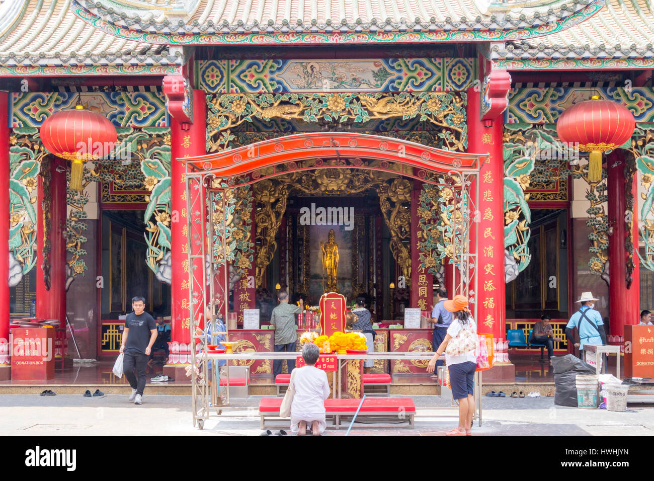 People making merit at the Thian Fah Foundation Hospital Chinese temple ...