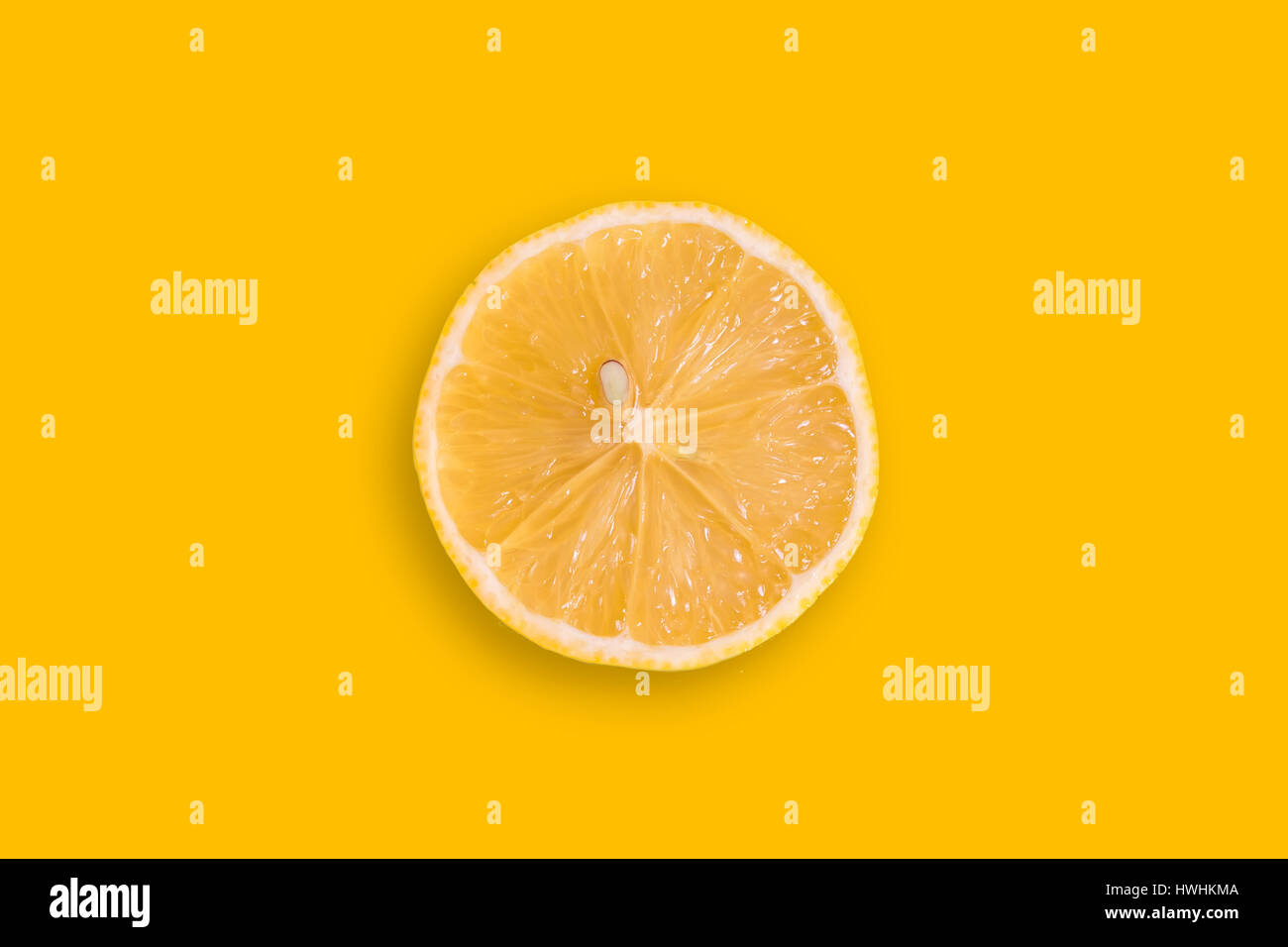 Lemon slice isolated on a yellow background. Flat lay juicy fruit Stock ...