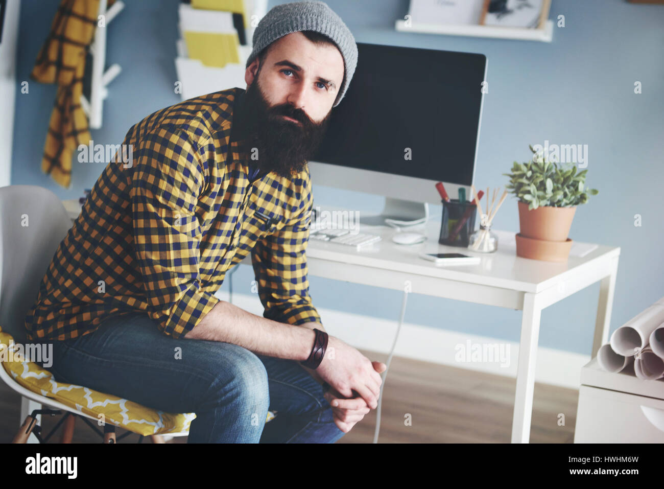 Young man working at home Stock Photo - Alamy