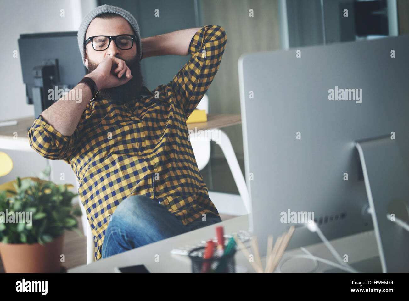 Sitting with hands over his eyes hi-res stock photography and images ...