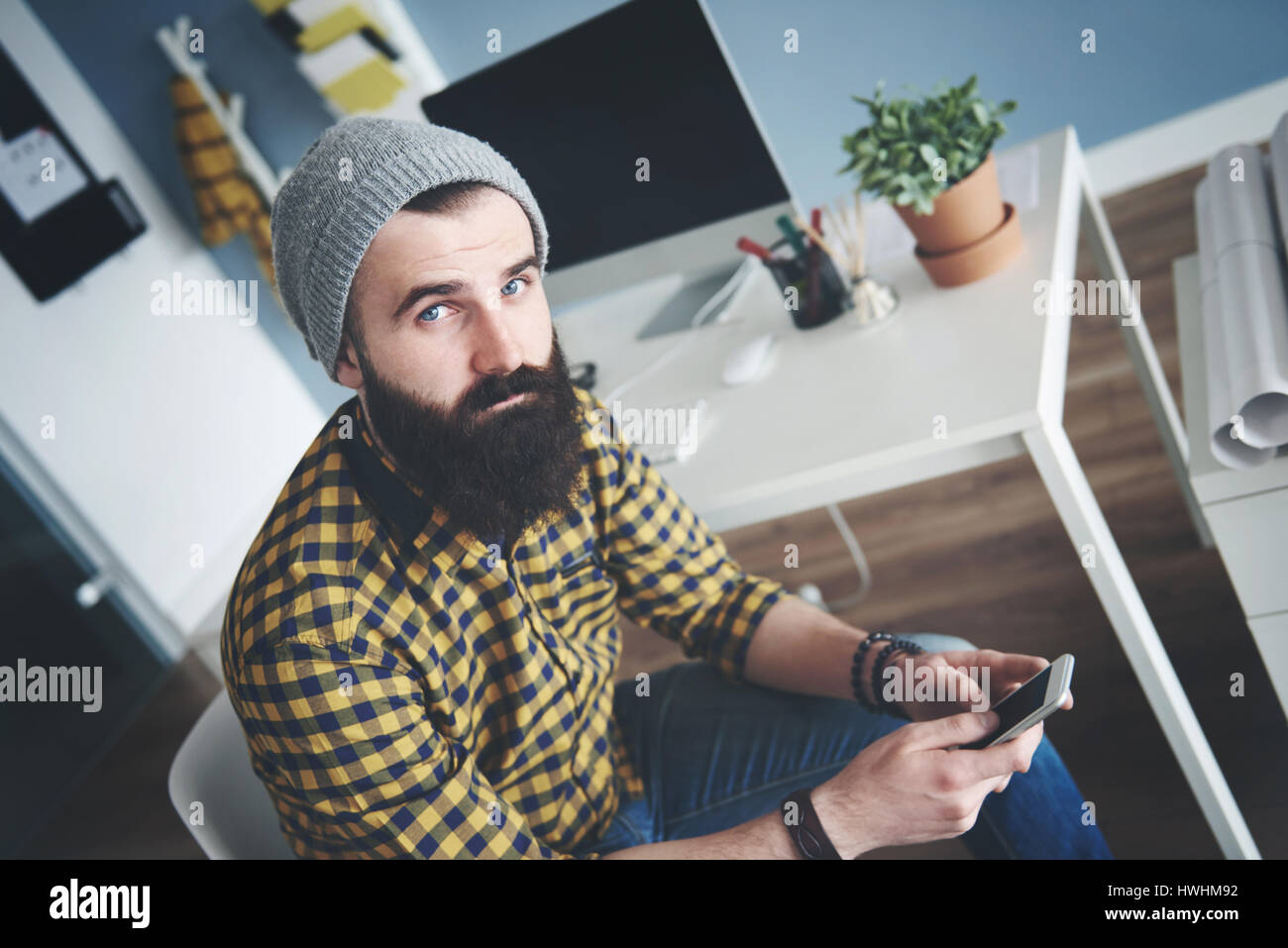 View of busy man using mobile phone Stock Photo - Alamy