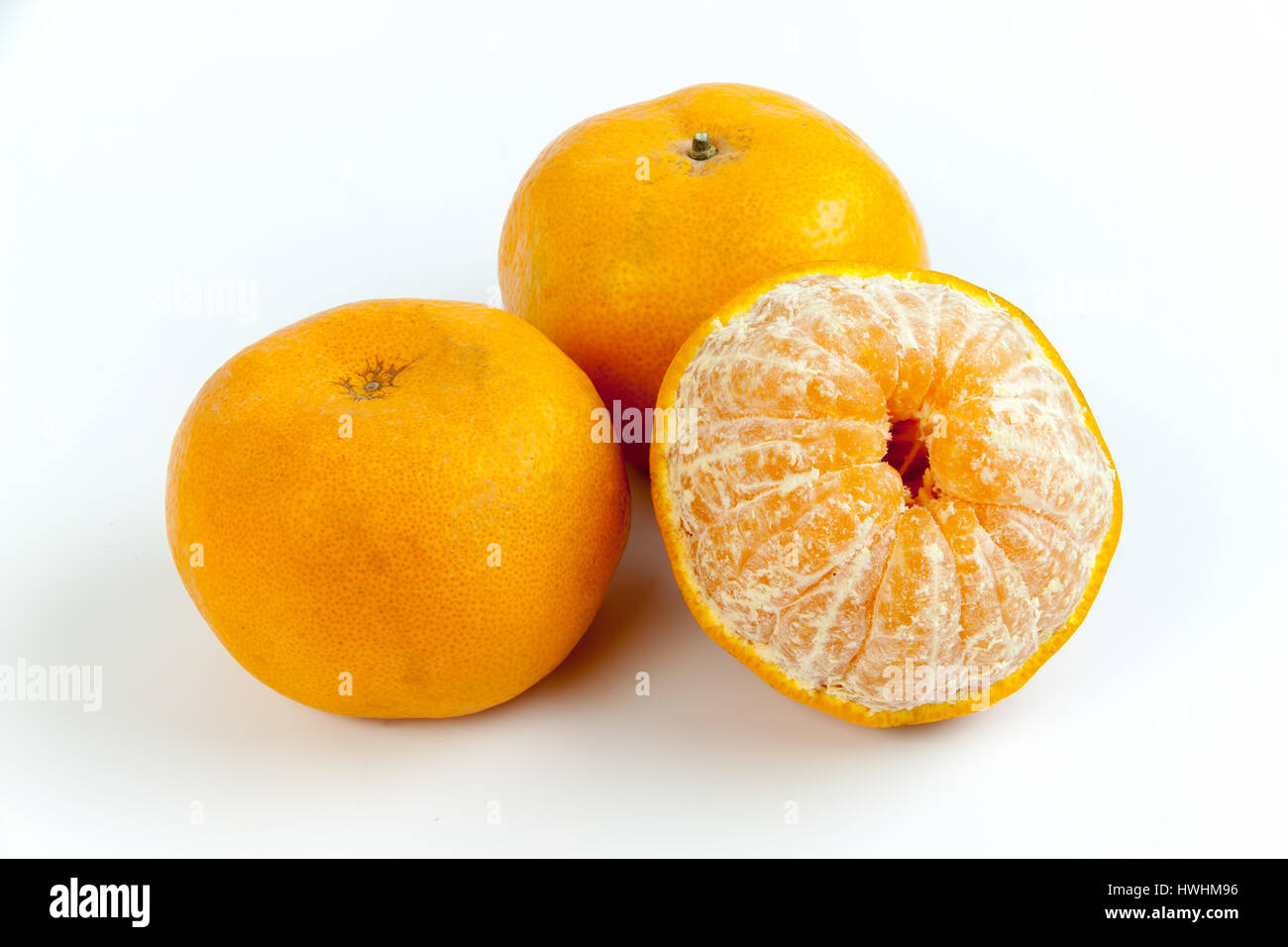 Ripe oranges isolated on white background. Orange in a cut Stock Photo ...