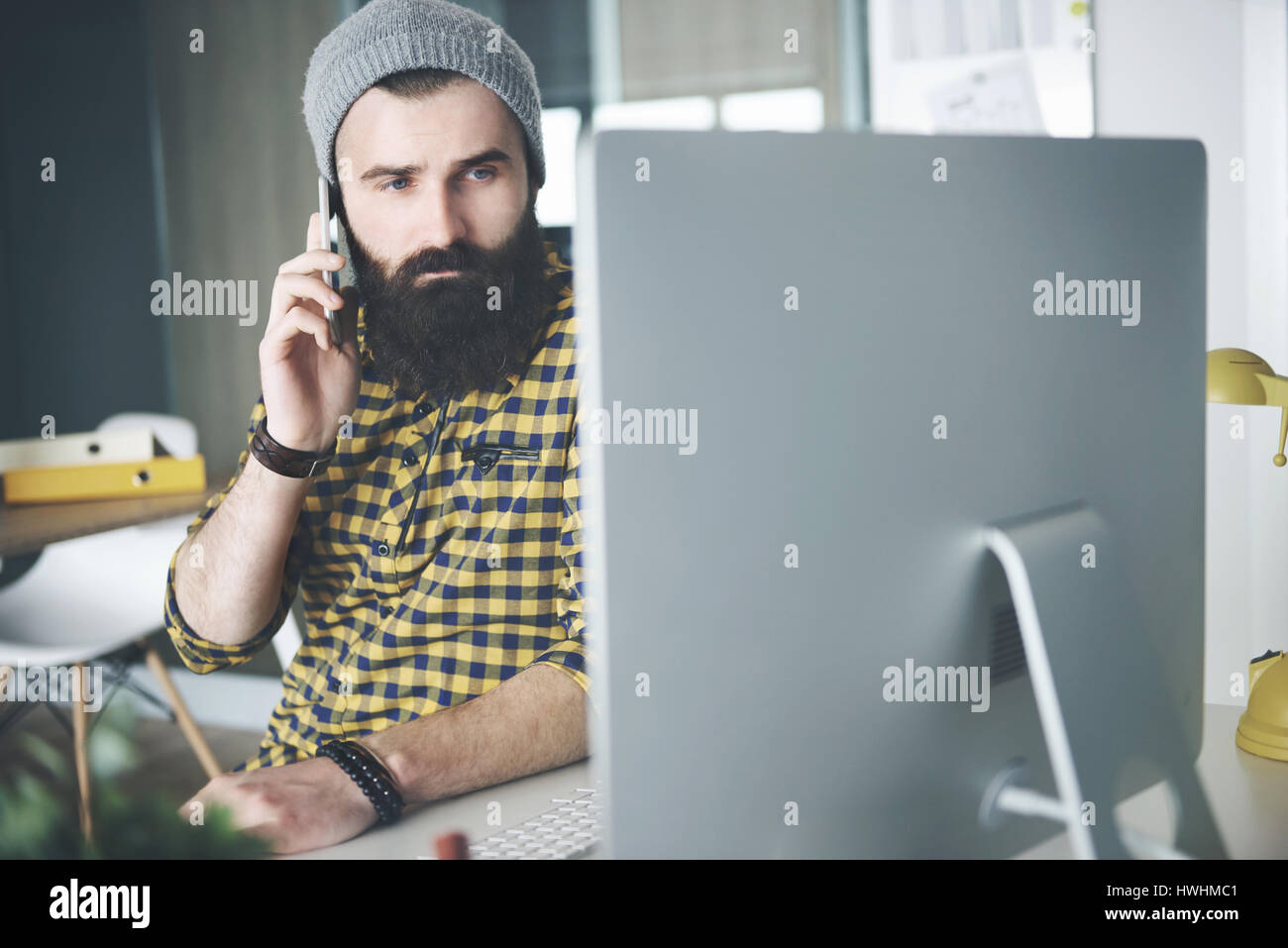 Young professional male working hi-res stock photography and images - Alamy