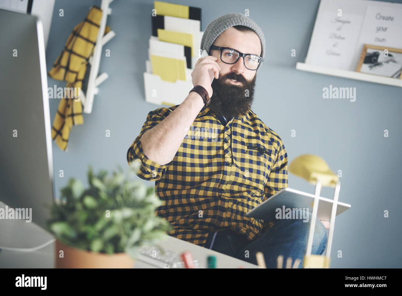Man with beard over busy day Stock Photo - Alamy