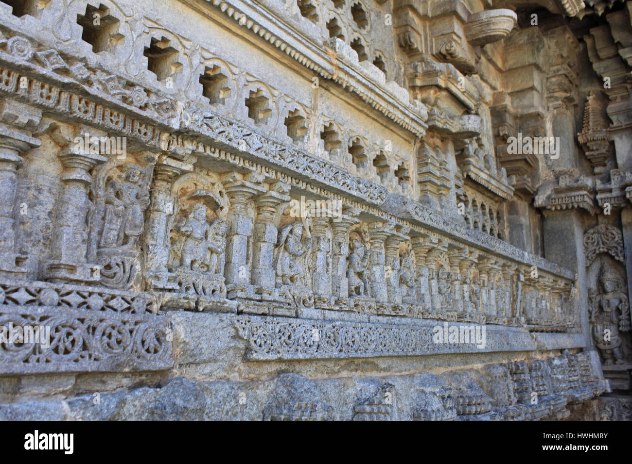 Wall relief, pierced windows and molding frieze at the Chennakesava ...