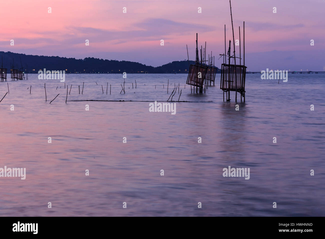 Fishing net and sunset Stock Photo - Alamy