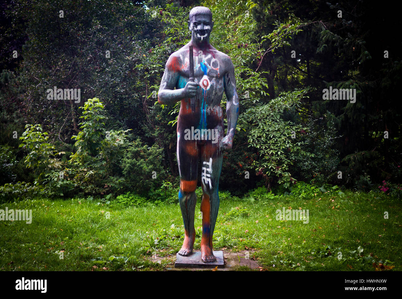 A graffitied statue in a park in Berlin, Germany Stock Photo - Alamy