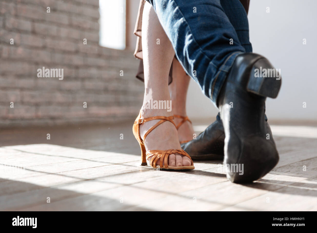 Learning tango steps together. Skillful talented capable dance couple ...