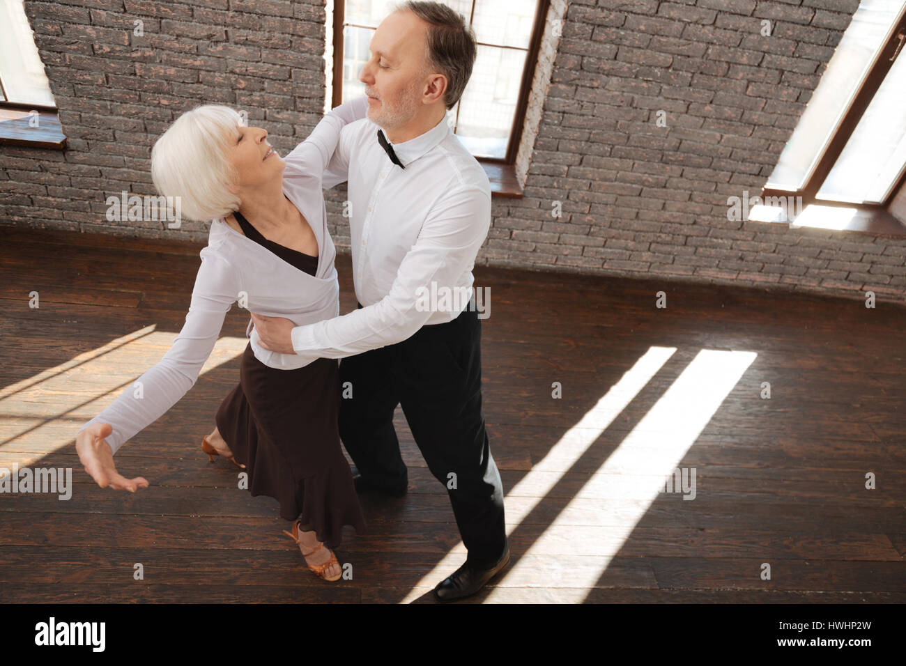 The dance of our youth. Lovely optimistic capable elderly couple ...
