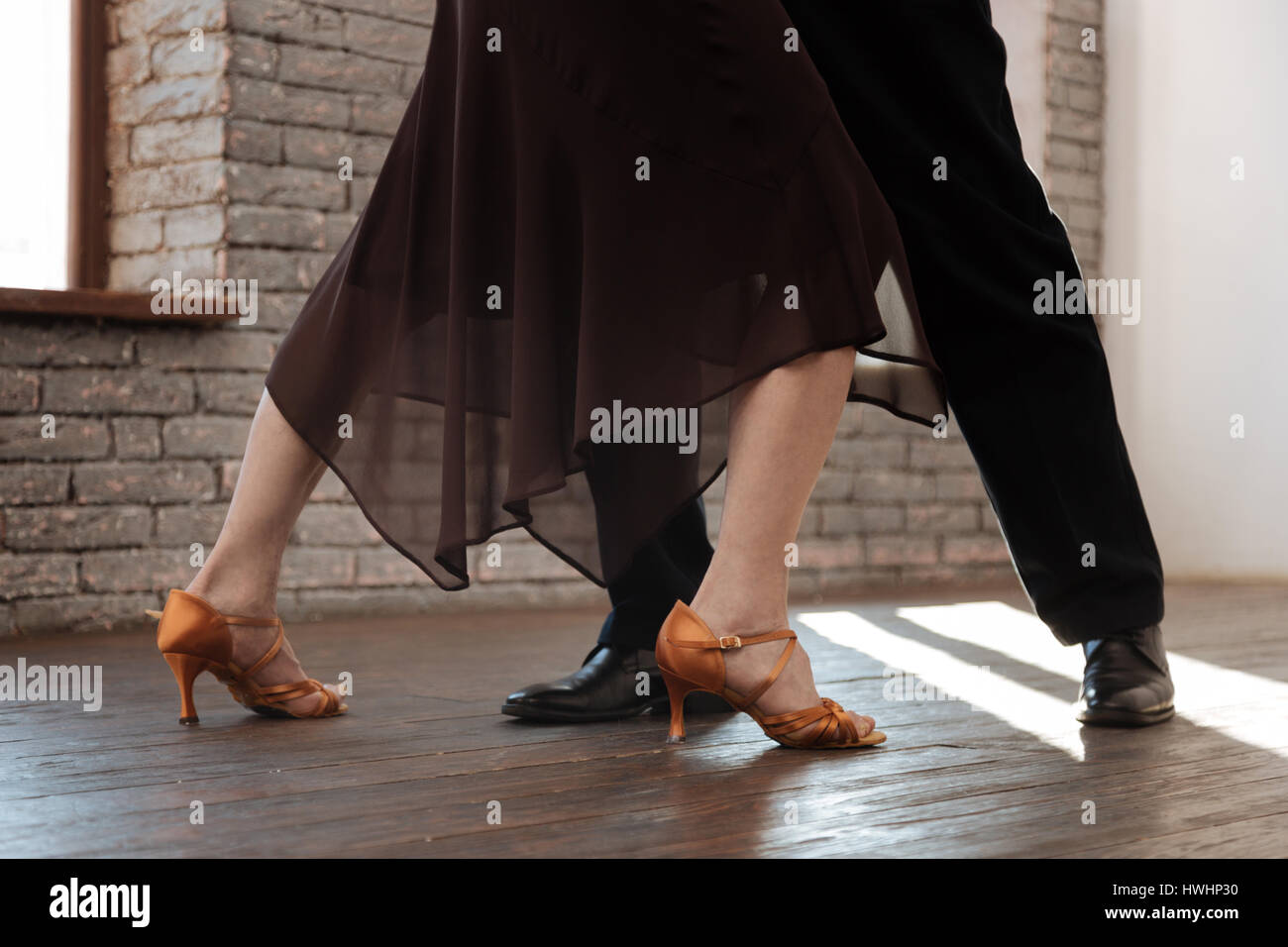 Still remember every step. Skillful crafty senior dance couple waltzing ...