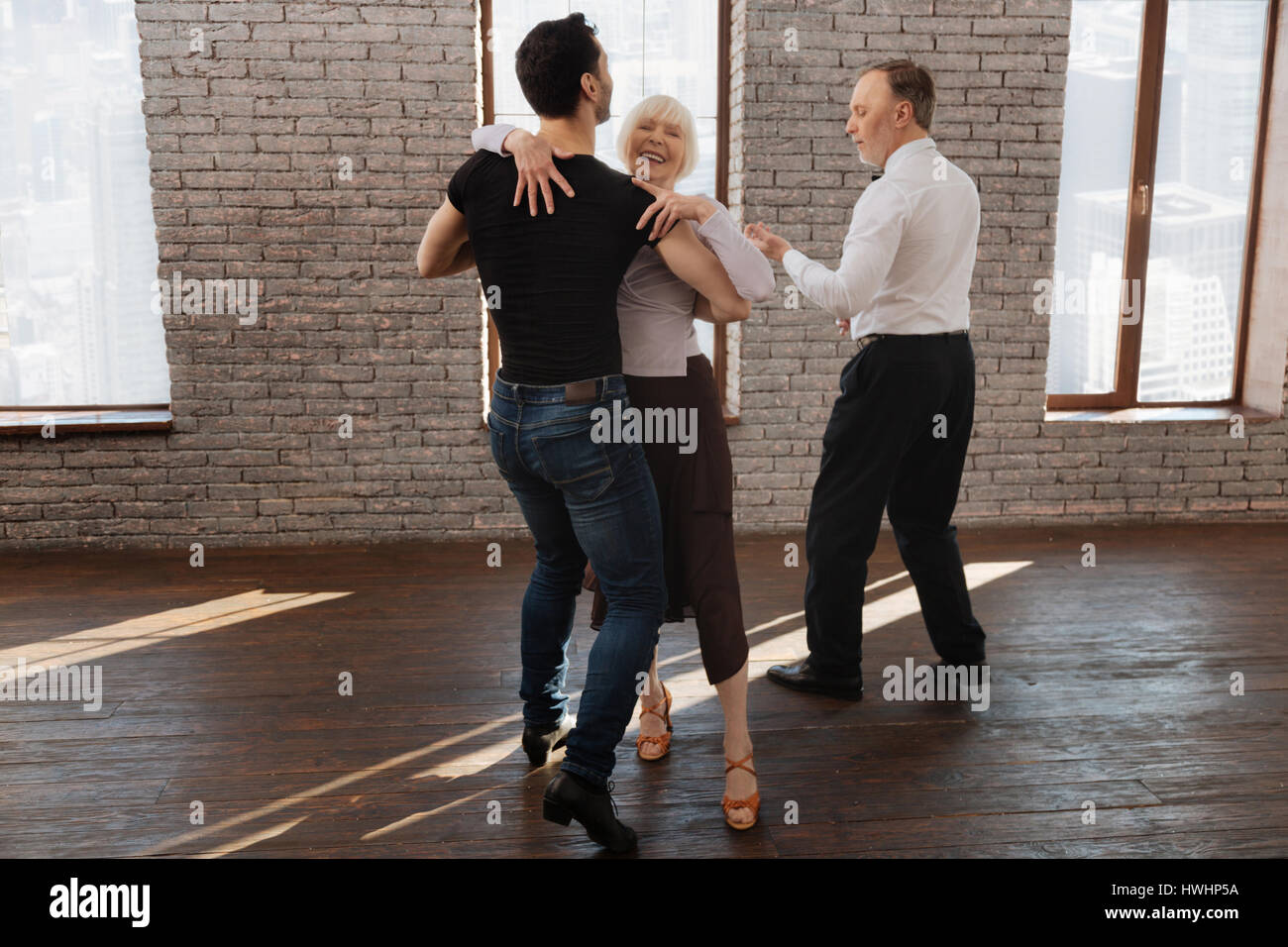 Enjoyable process of learning . Careful mature skilled dance couch ...