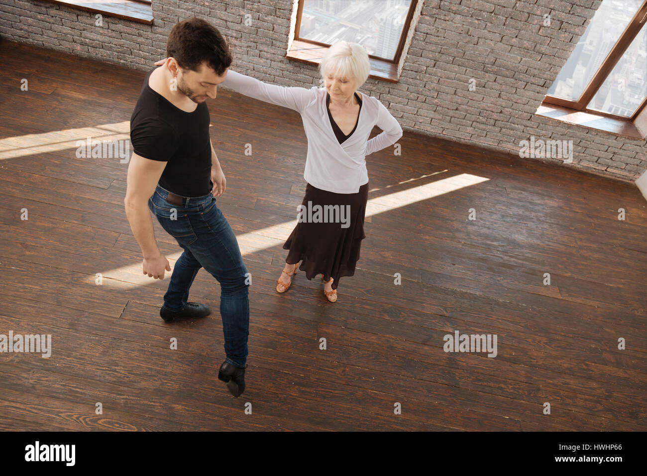 Enjoying my profession. Handsome young professional dance couch ...