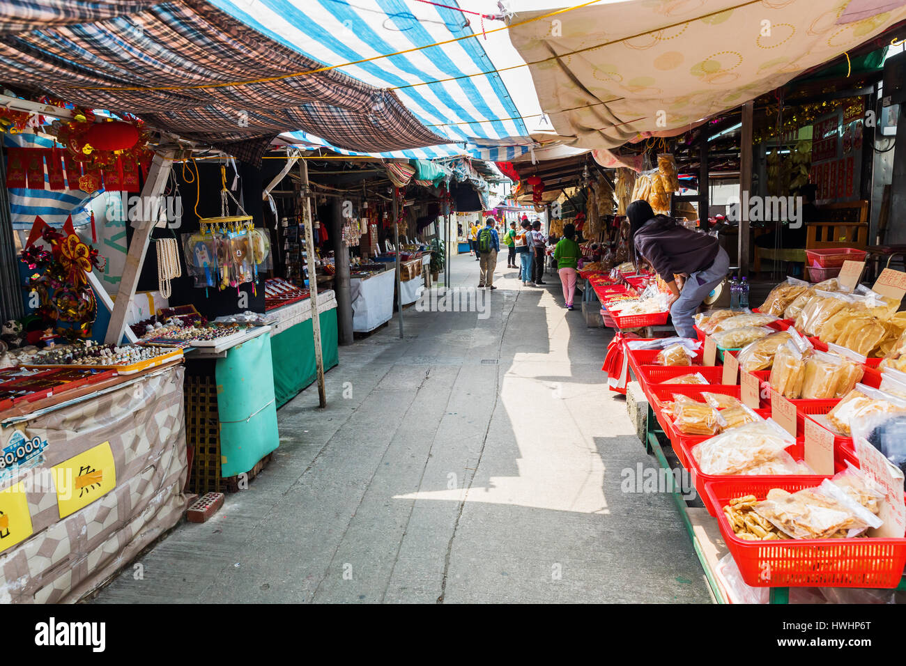 Tai O, Hong Kong - March 13, 2017: market street with unidentified ...
