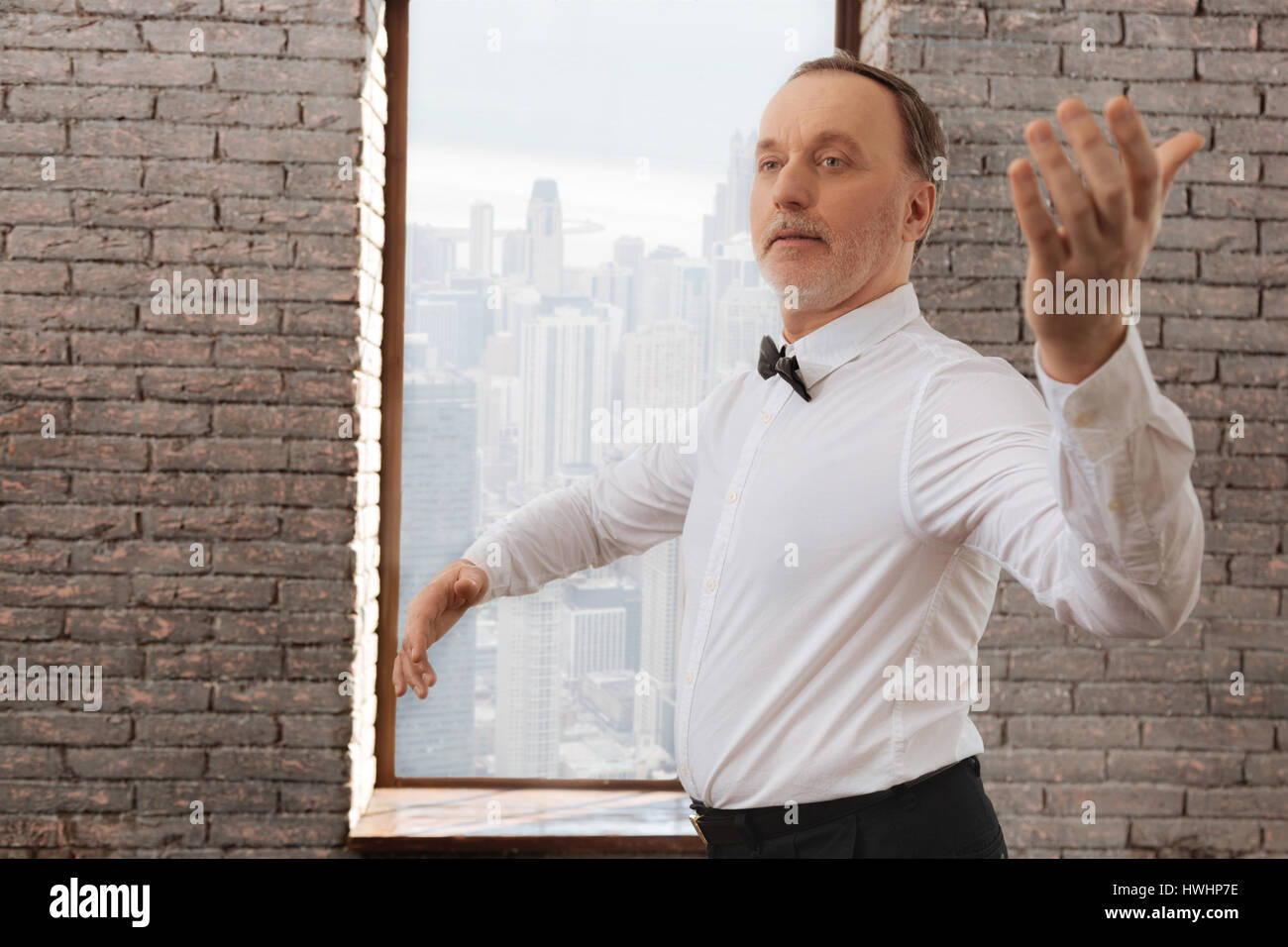 Enjoying every step. Charismatic capable concentrated aged man ...