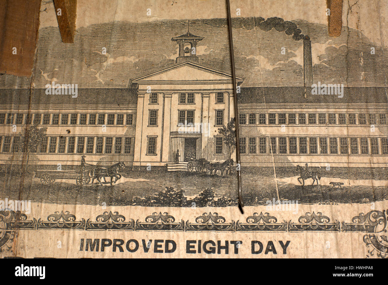 Label inside an antique E.N.Welch Eight day brass clock Stock Photo - Alamy