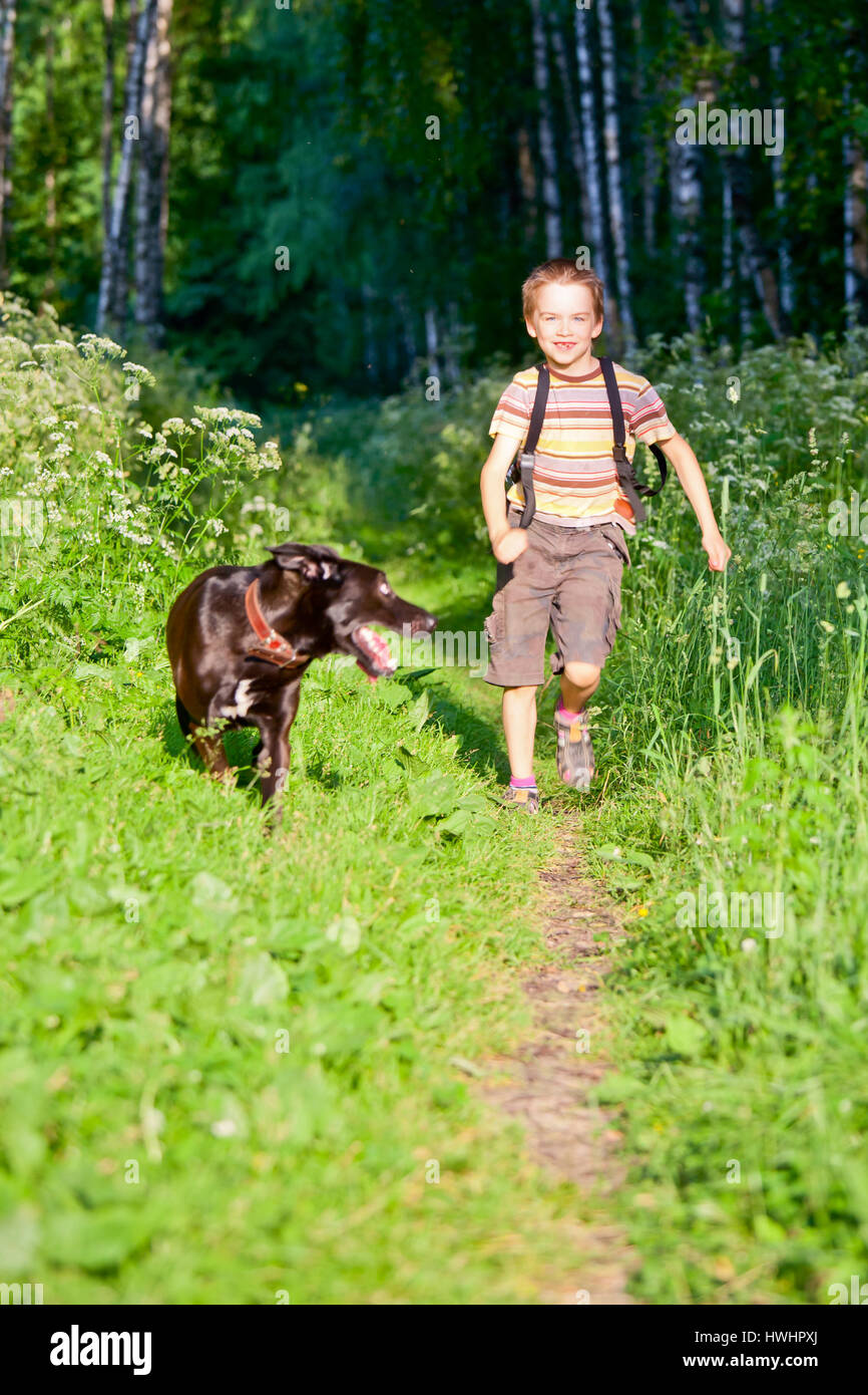 Black boy dog running hi-res stock photography and images - Alamy