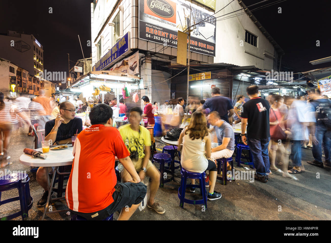 GEORGETOWN, MALAYSIA - NOVEMBER 12, 2016: People, captured with blurred ...