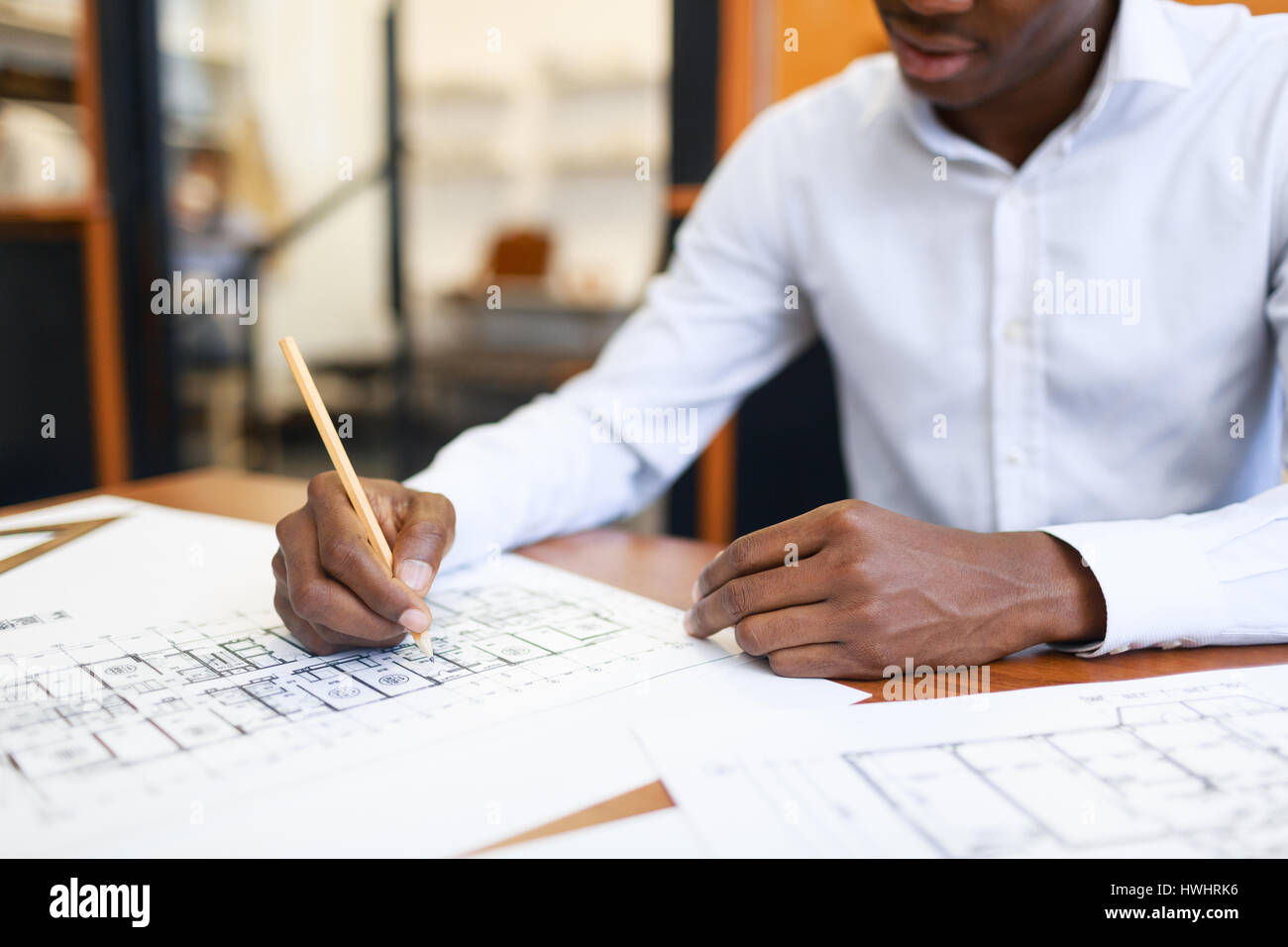 African-american constructor making sketch of new building Stock Photo ...