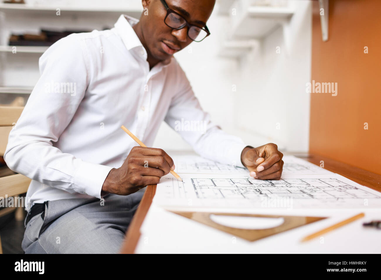 Civil engineering specialist drawing sketch by his workplace Stock ...