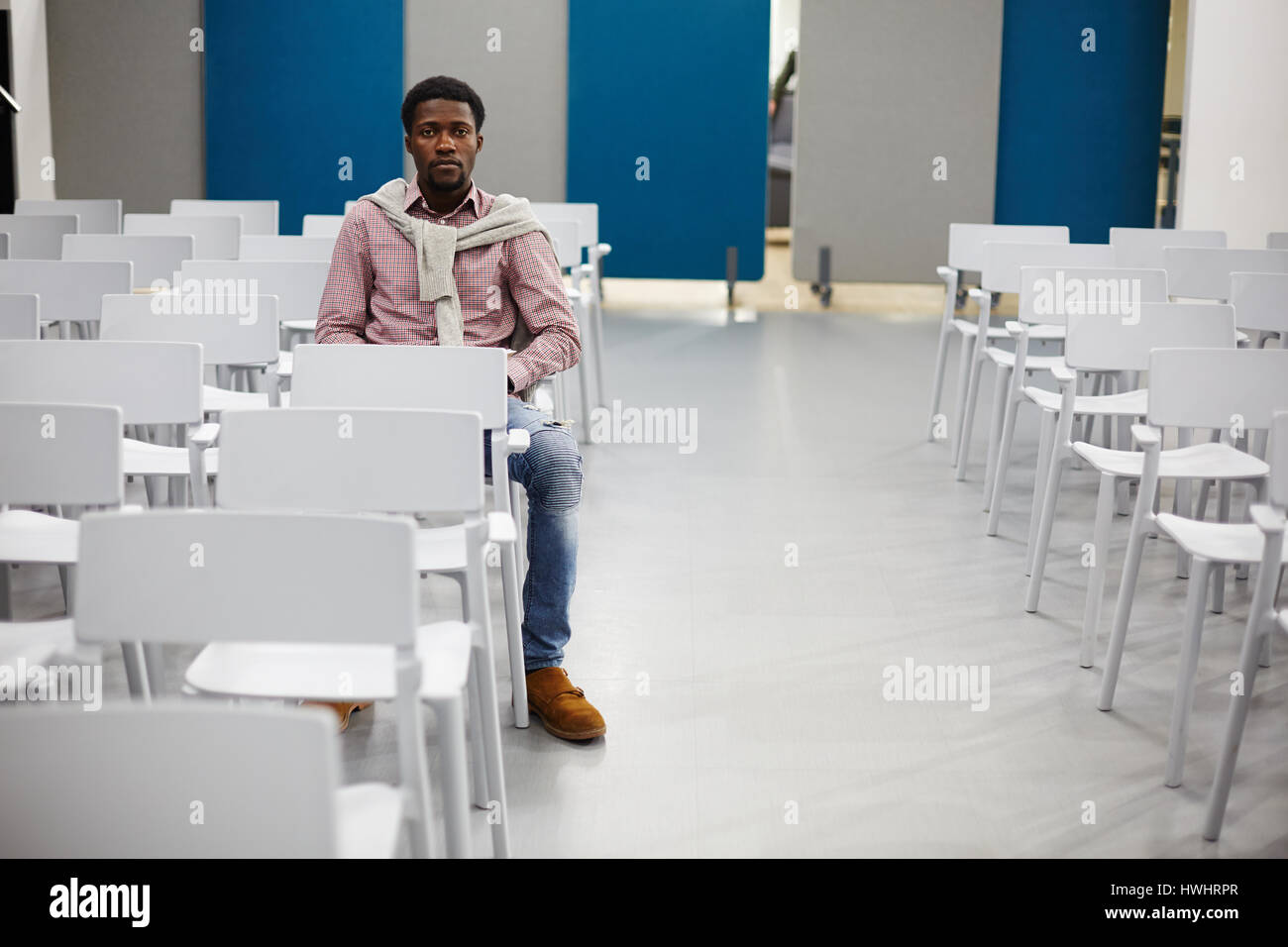 Student sitting exam hall hi-res stock photography and images - Alamy