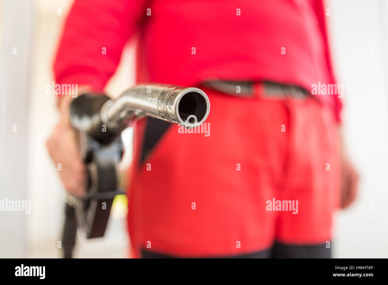 macro fuel nozzle to refill fuel in car at gas station Stock Photo - Alamy
