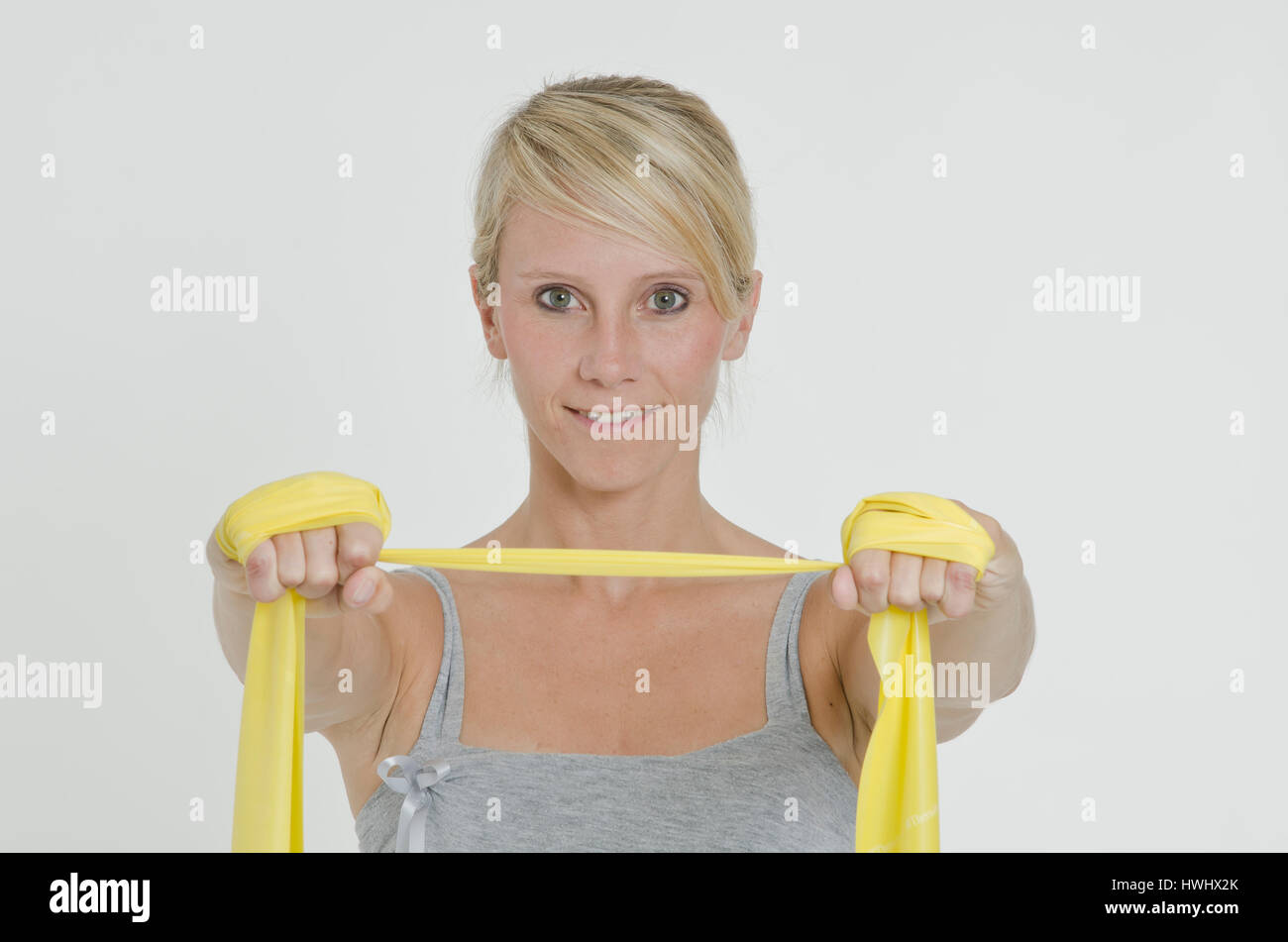 woman makes gymnastic Stock Photo - Alamy