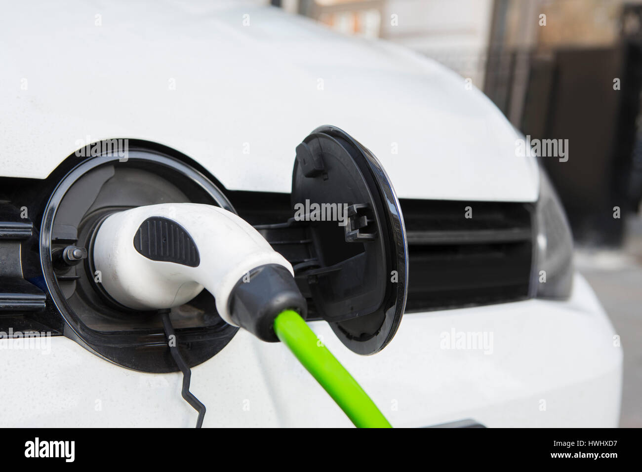 Close Up Of Electric Car Being Charged Stock Photo - Alamy