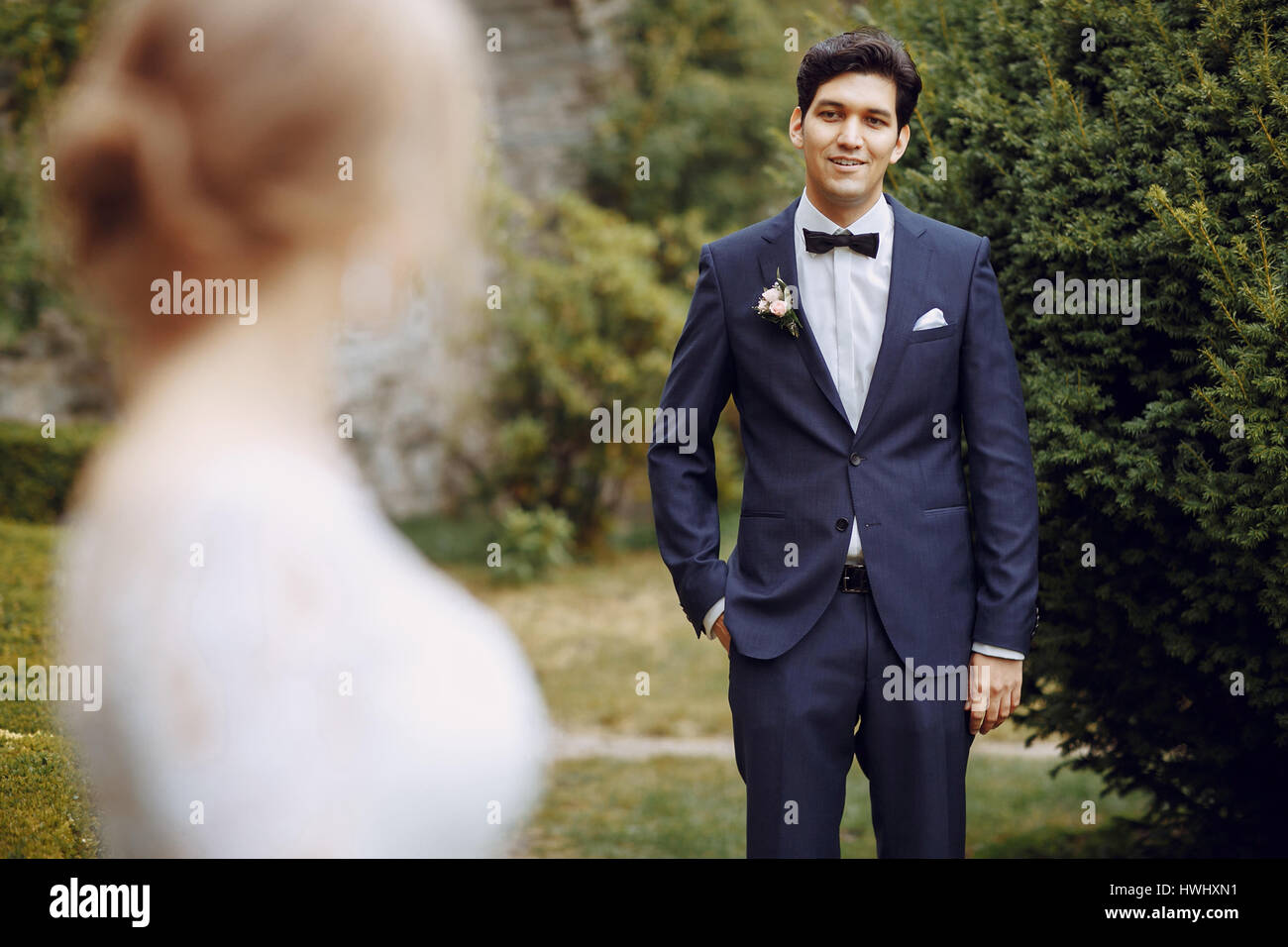 bride walking in the garden Stock Photo - Alamy