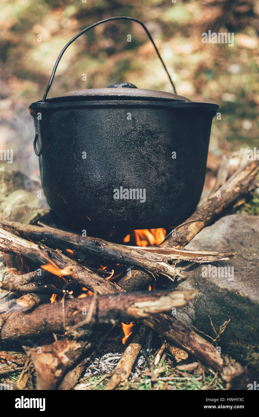 Pot on fire in forest hi-res stock photography and images - Alamy