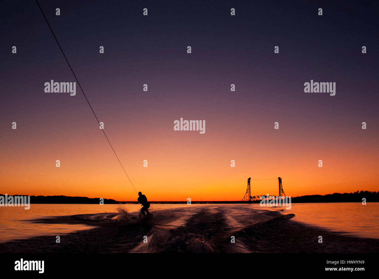 wakeboarding in a sunset Stock Photo - Alamy