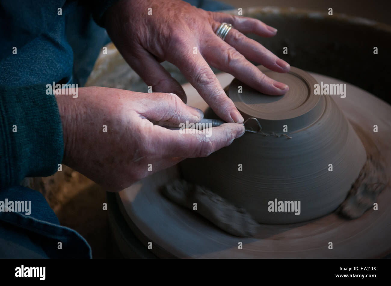 womans hands creating pottery objects in a ceramics workshop Stock ...