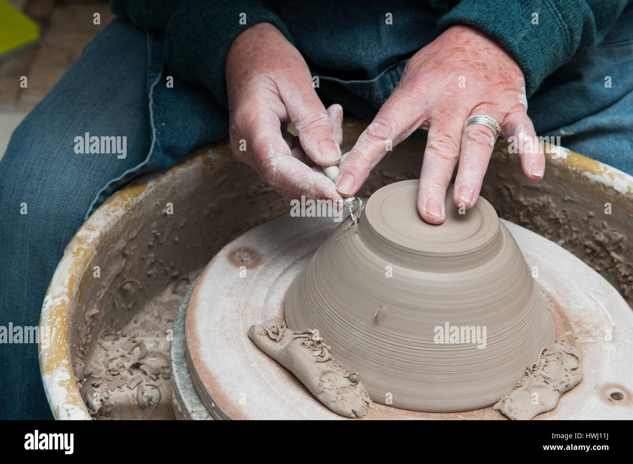 womans hands creating pottery objects in a ceramics workshop Stock ...