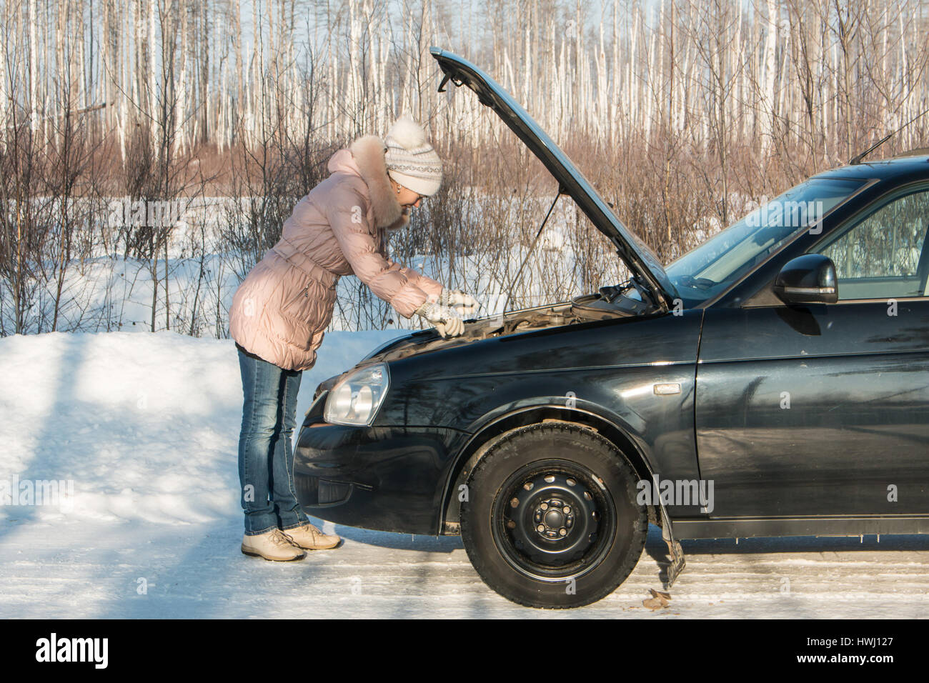 Woman mending a car hi-res stock photography and images - Alamy