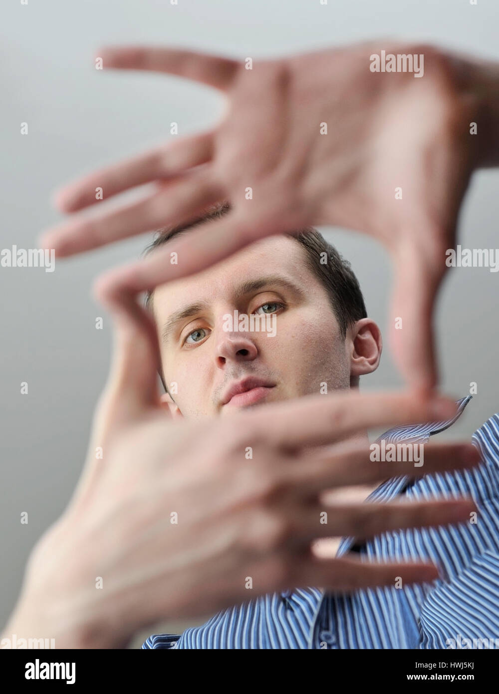 Man with hand gesture Stock Photo - Alamy