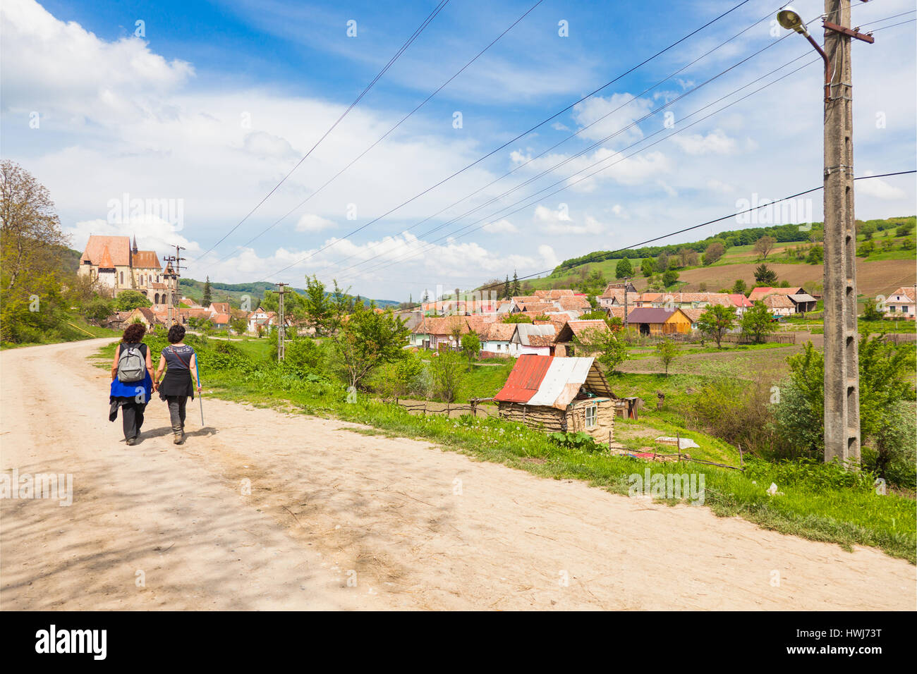 People walking near village hi-res stock photography and images - Alamy
