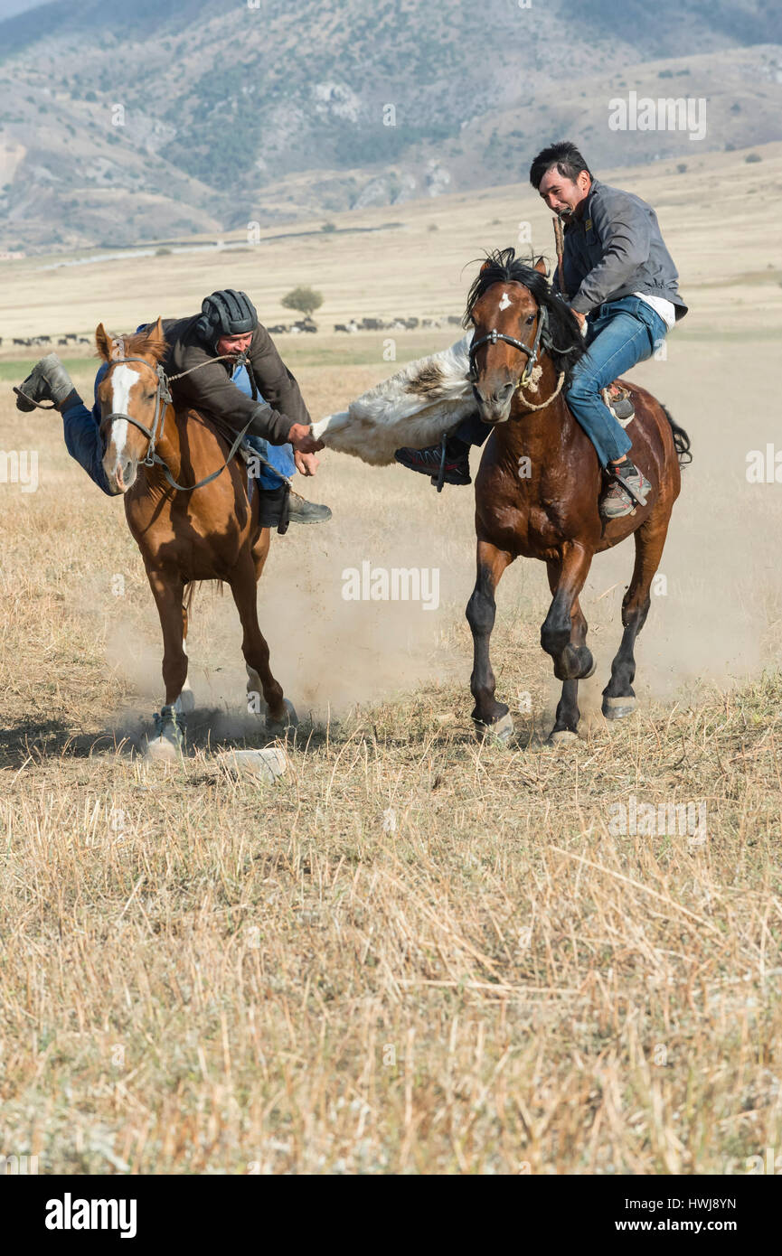 Traditional Kokpar or buzkashi in the outskirts of Gabagly national ...