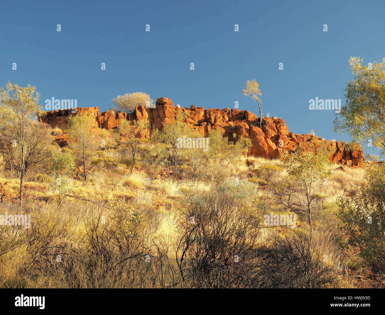 Glowing outback rock formation of the MacDonnell ranges, Alice Springs ...