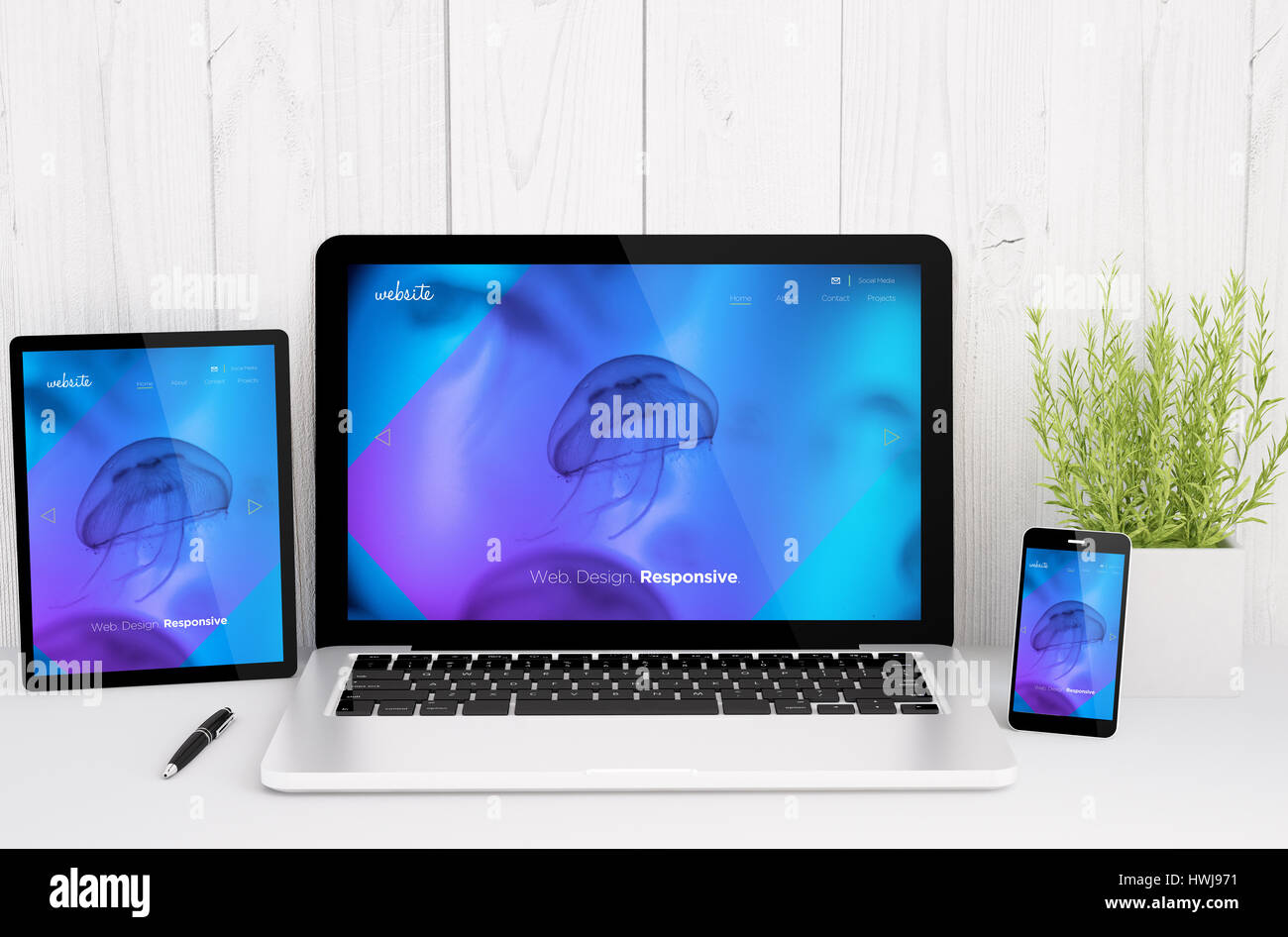 3d rendering of devices on table with cool responsive design website ...