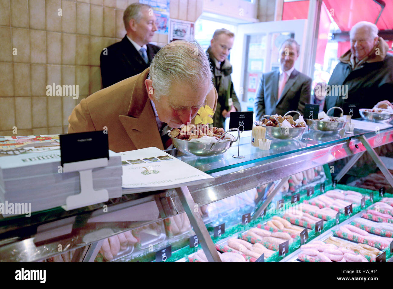 The Prince of Wales looks at products in Cowmans Famous Sausage Shop ...