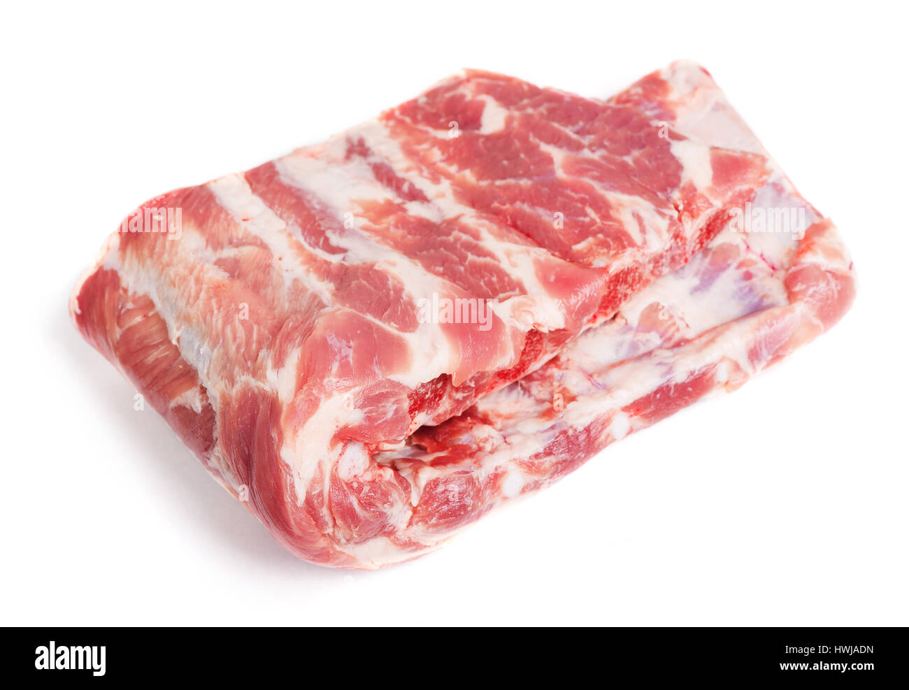 Raw pork ribs isolated on white background Stock Photo - Alamy