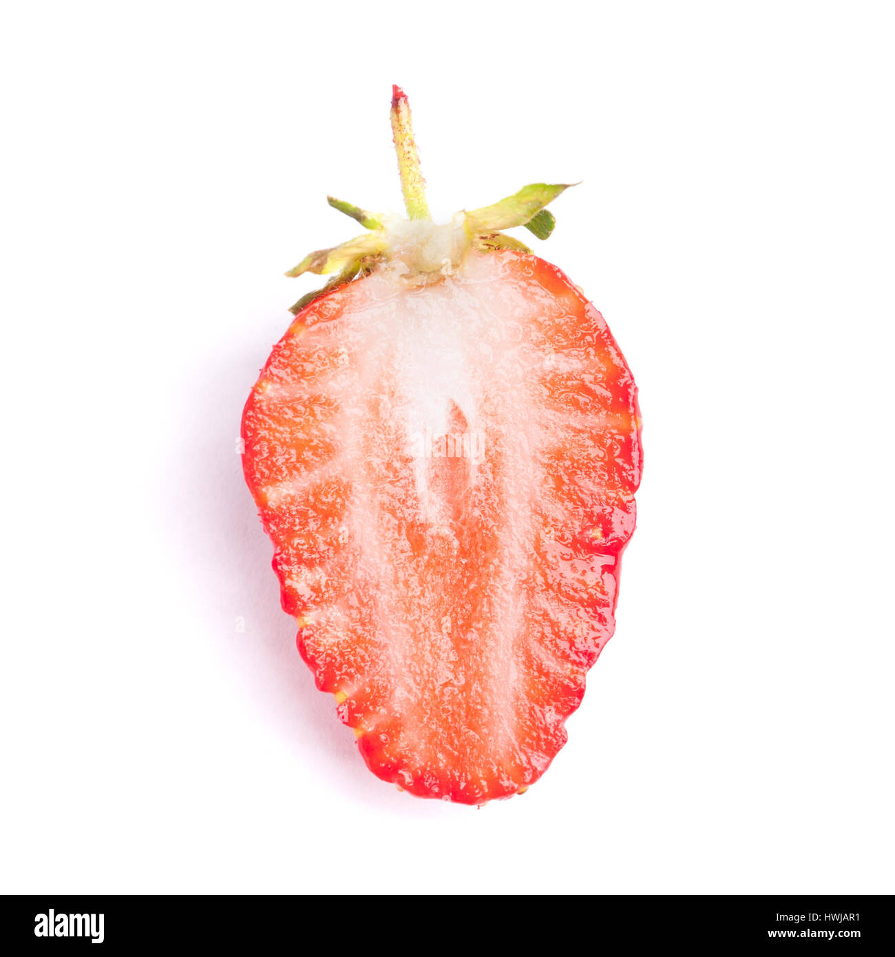 Half of strawberry isolated on white background Stock Photo - Alamy