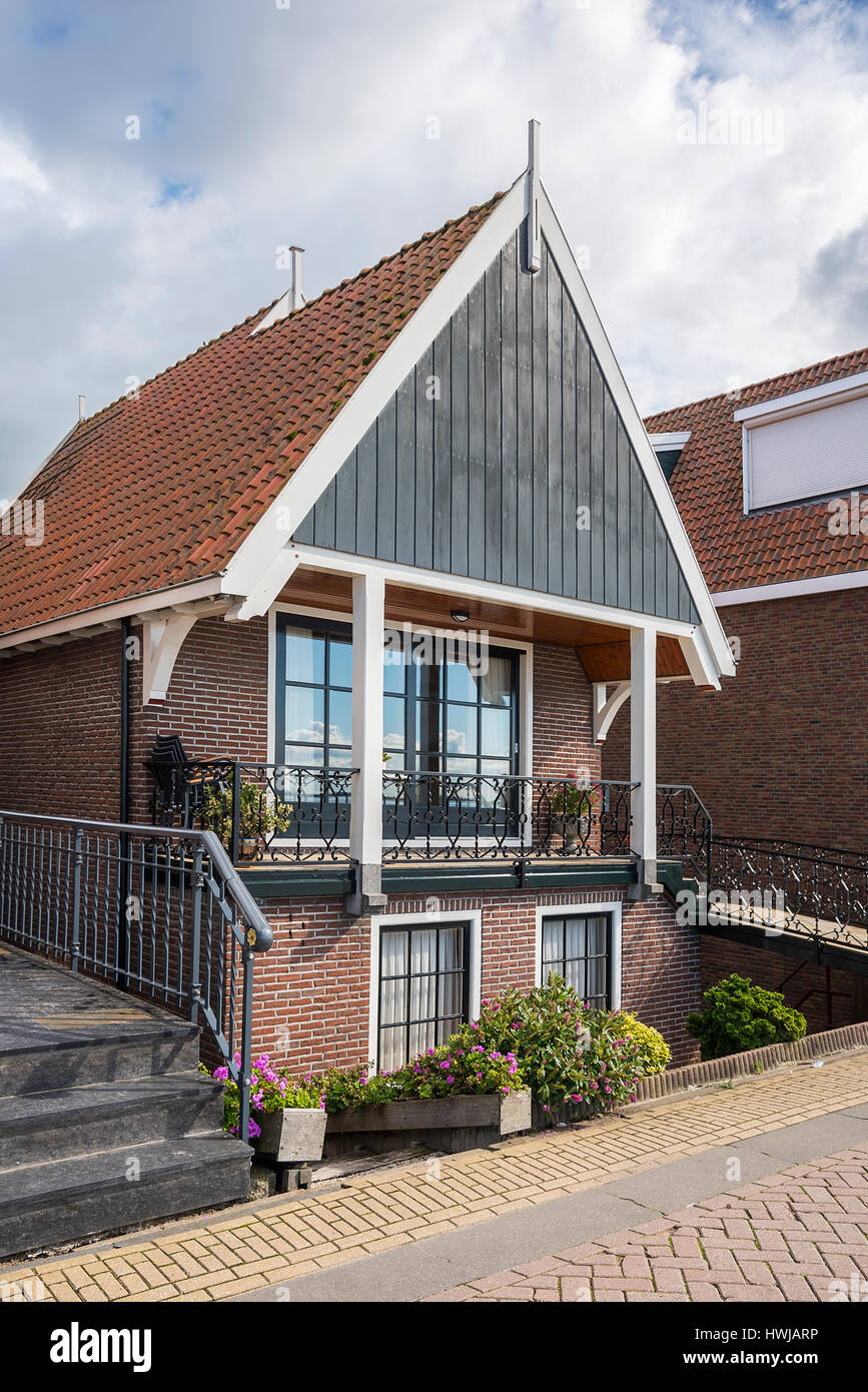 Dutch small house with a tiled roof Stock Photo - Alamy