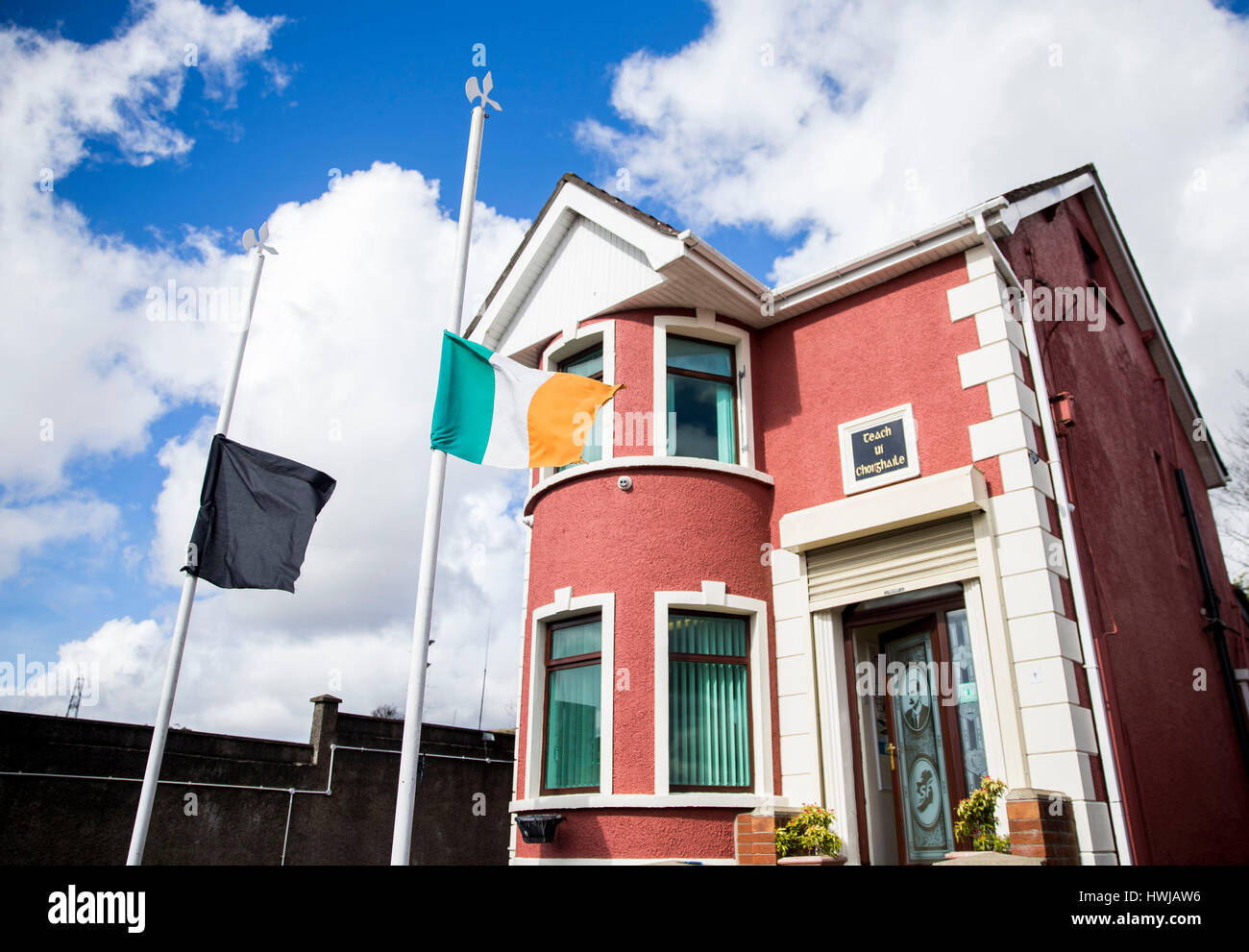 A black flag and the national flag of Ireland referred to as the Irish ...
