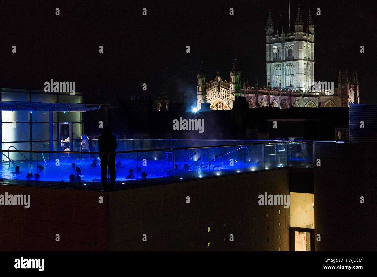 The rooftop Thermae Bath Spa at night in Bath, England. The tower of ...