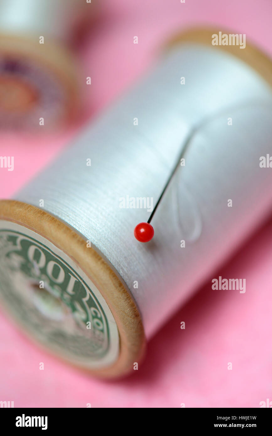 pin and cotton reel Stock Photo - Alamy