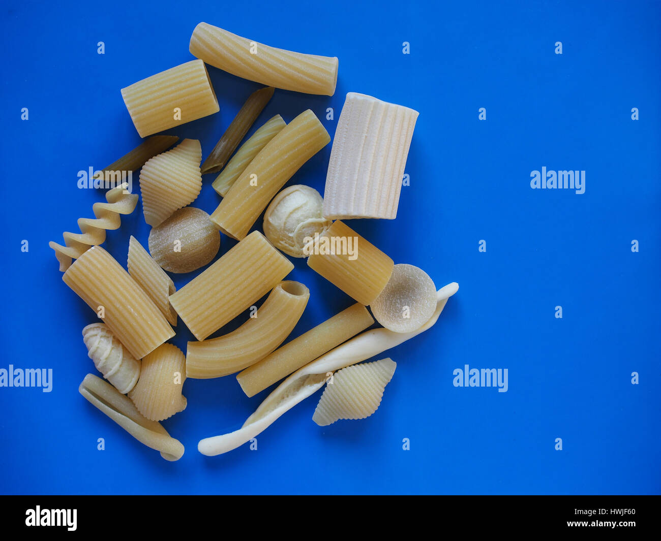 Many different types of Italian pasta including penne macaroni ...